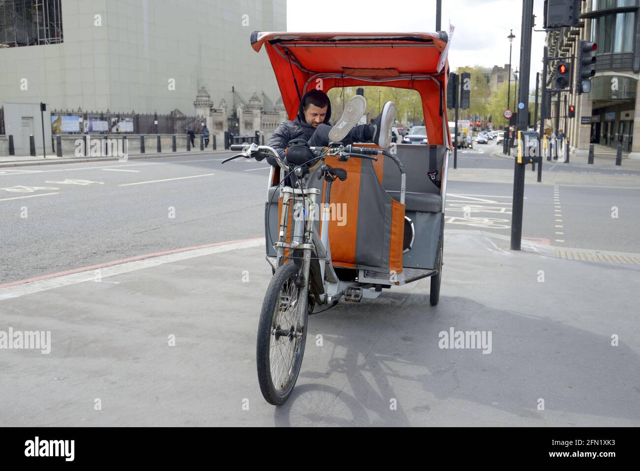 Pedal rickshaw hi-res stock photography and images - Alamy
