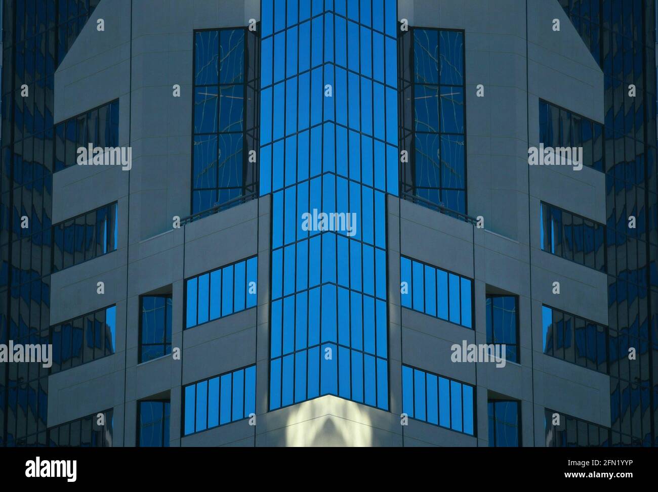 High-rise building white cladding and blue glass facade in La Jolla ...