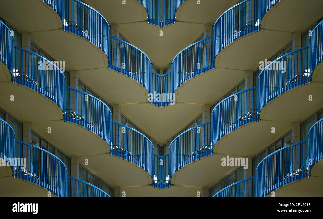 Symmetrical balconies with a blue railing of the Wyndham San Diego ...