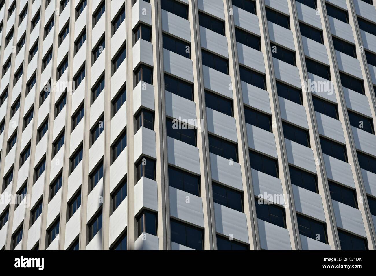 High-rise residential condominiums complex facade with symmetrical ...