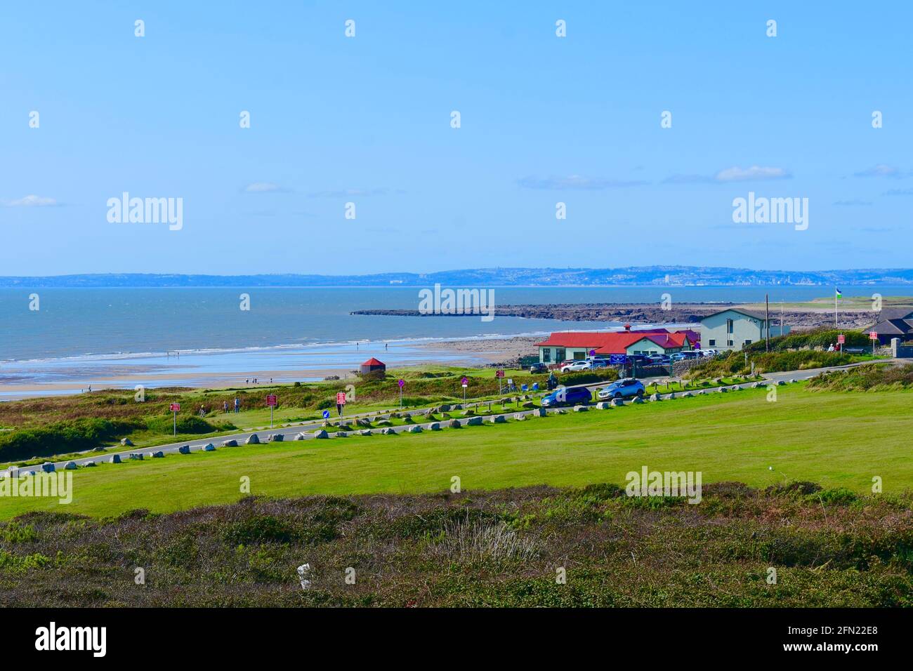A view across the common towards the popular surfing beach at Rest Bay ...