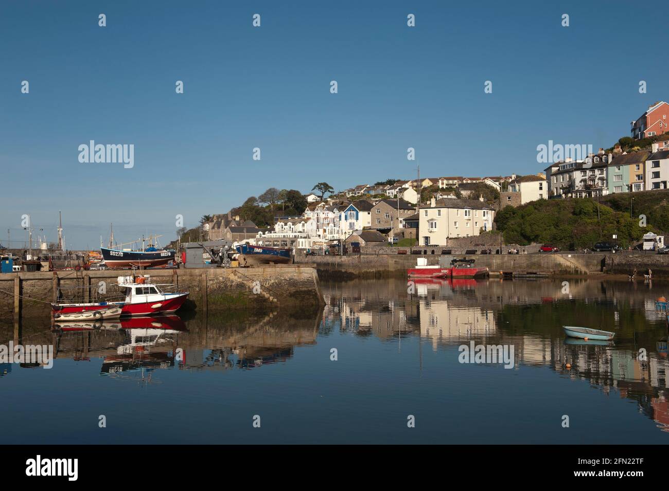 Boats Moored Brixham and Town Devon Stock Photo - Alamy