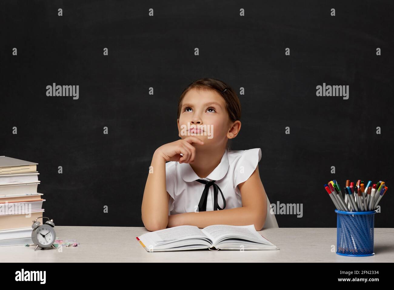 Child daydreaming classroom hi-res stock photography and images - Alamy