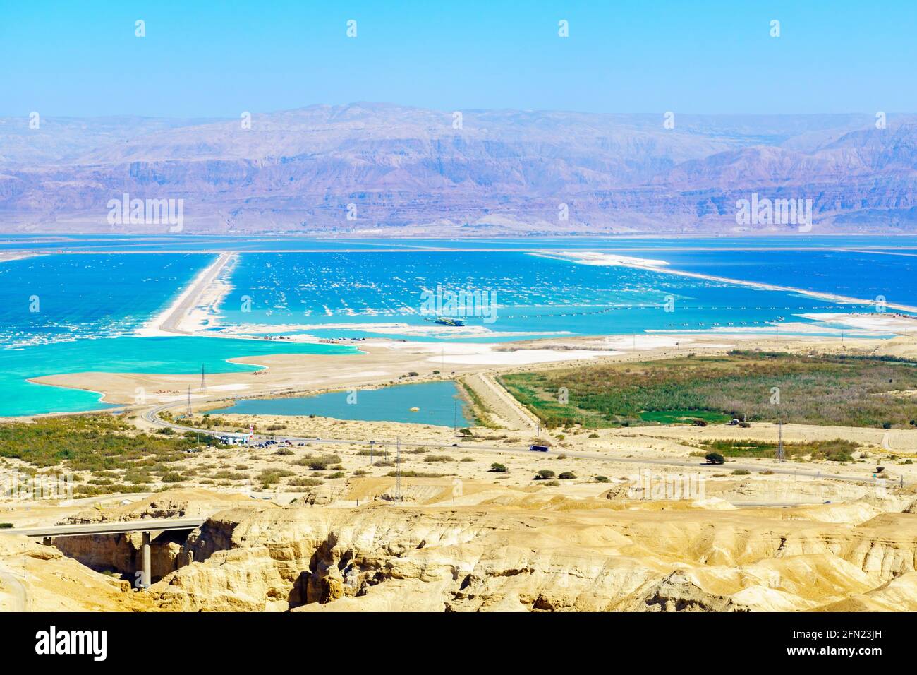 View of salt evaporation pools in the southern part of the Dead Sea ...