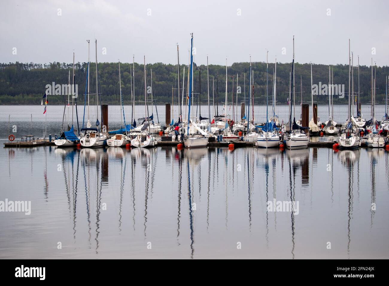 Spalt, Germany. 13th May, 2021. Sailboats are moored at a jetty on Lake ...
