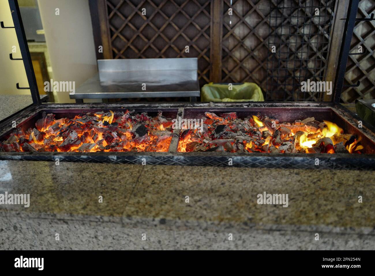 Fire and ash in grill Stock Photo - Alamy