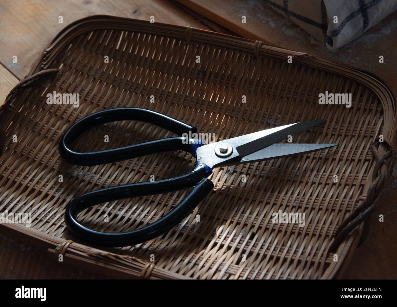 The scissors in the bamboo basket Stock Photo - Alamy