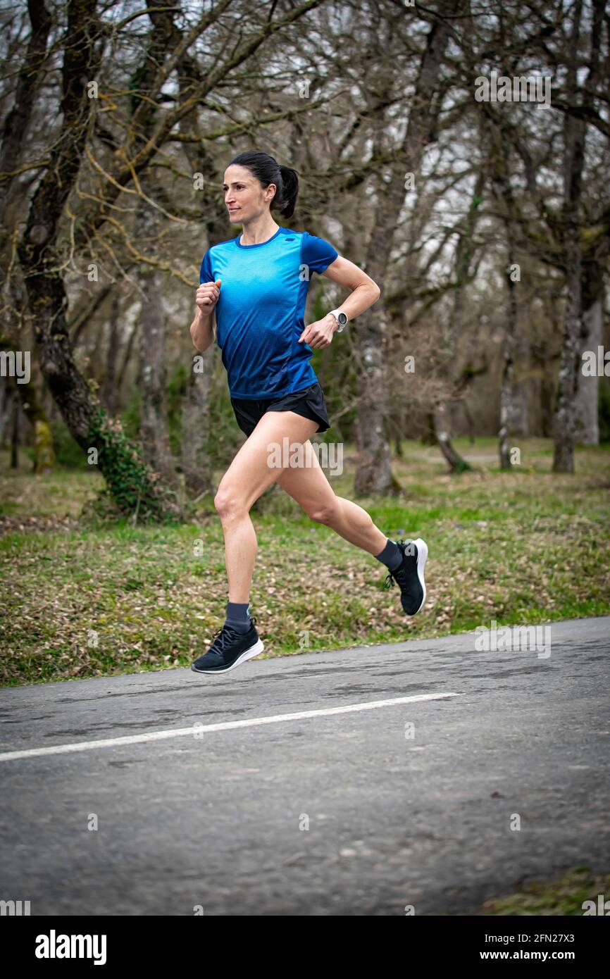 Girl running in nature, it is her healthy and free lifestyle Stock ...