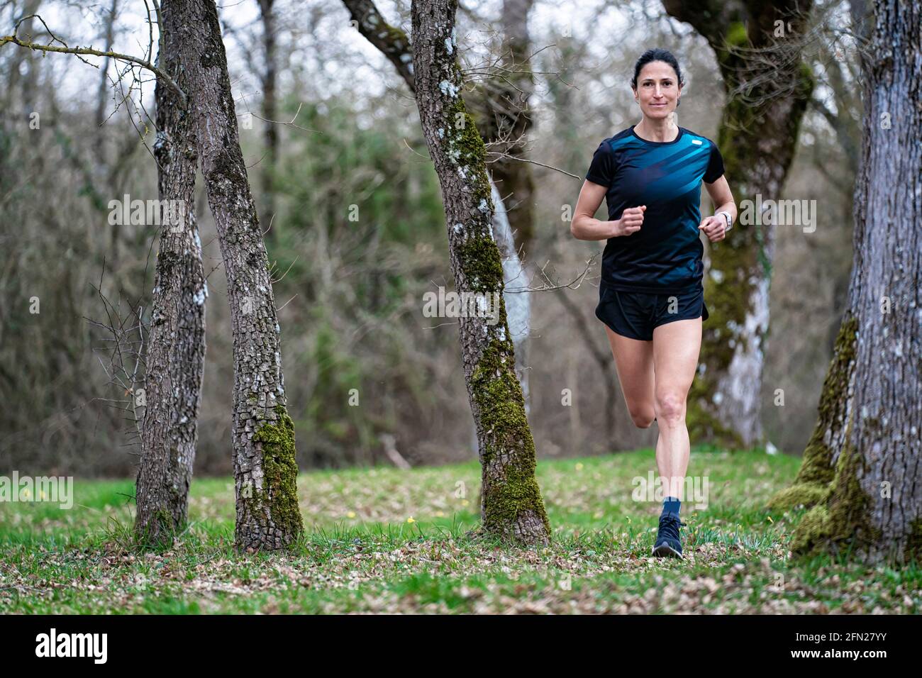 Girl running in nature, it is her healthy and free lifestyle Stock ...