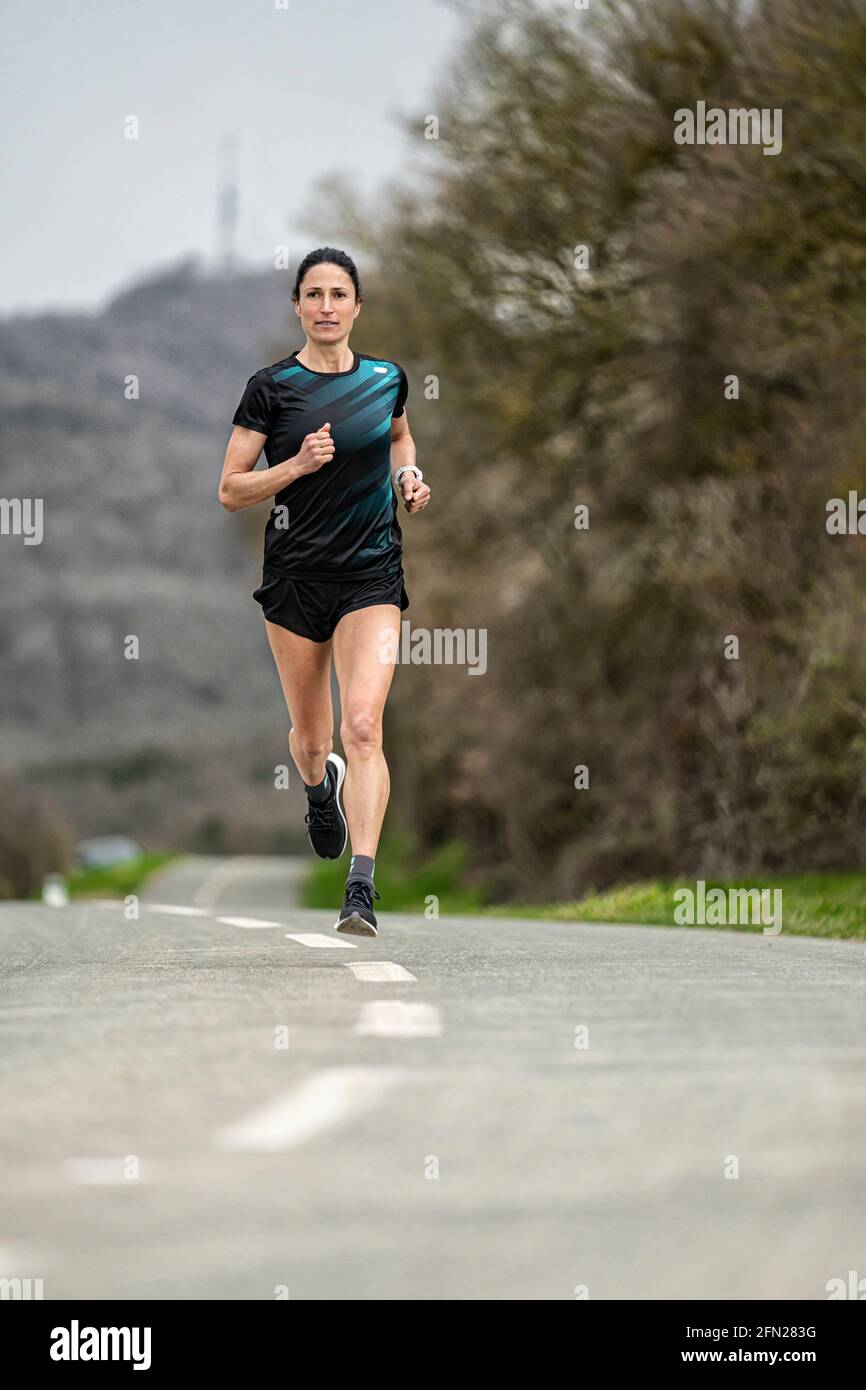 Girl running in nature, it is her healthy and free lifestyle Stock ...
