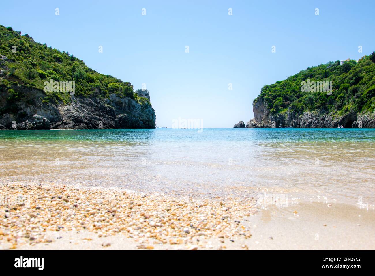 Beautiful bay with beach in front Stock Photo - Alamy