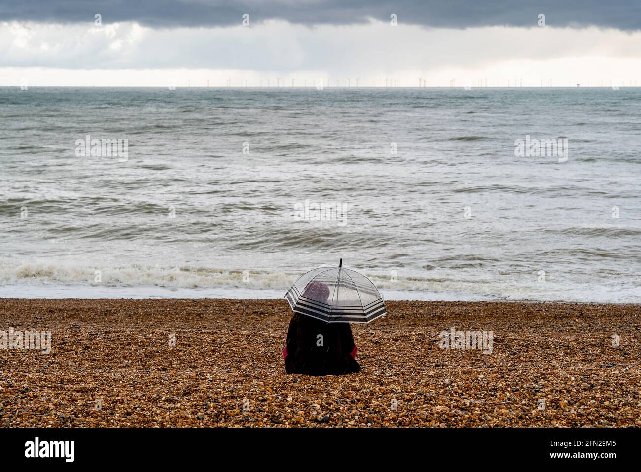 Sitting down at the beach hi-res stock photography and images - Alamy