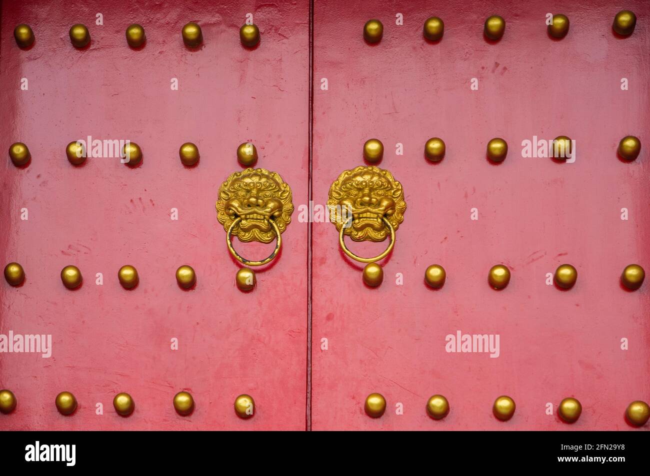 Ancient red door closed Stock Photo - Alamy