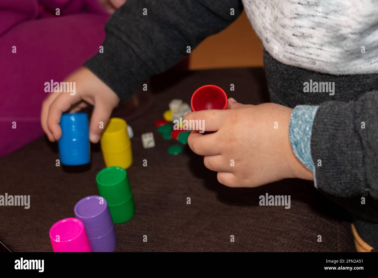 Boy playing board games Stock Photo - Alamy