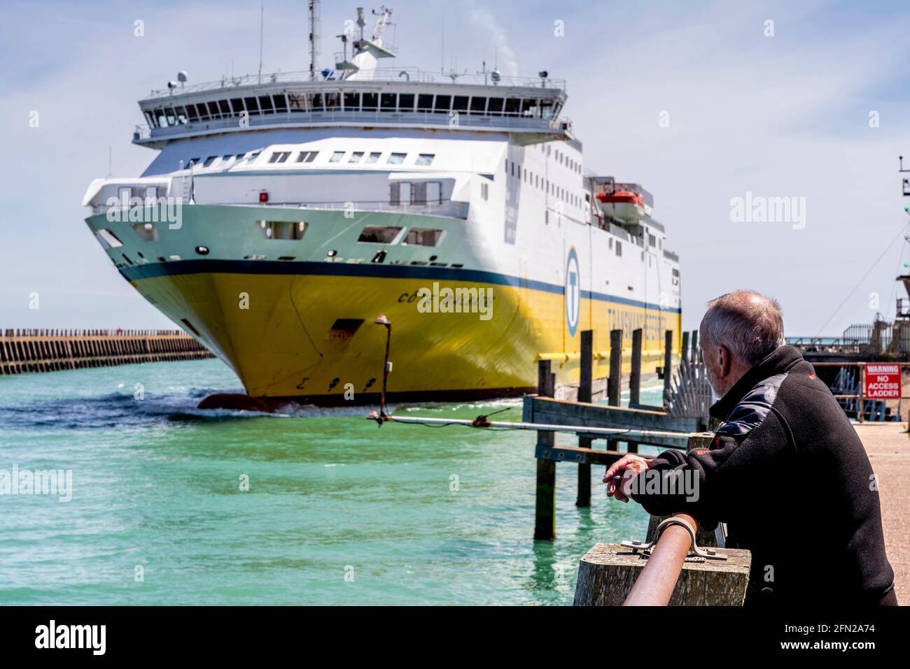 A Man Watches The Transmanche Newhaven - Dieppe Ferry Arriving At The ...