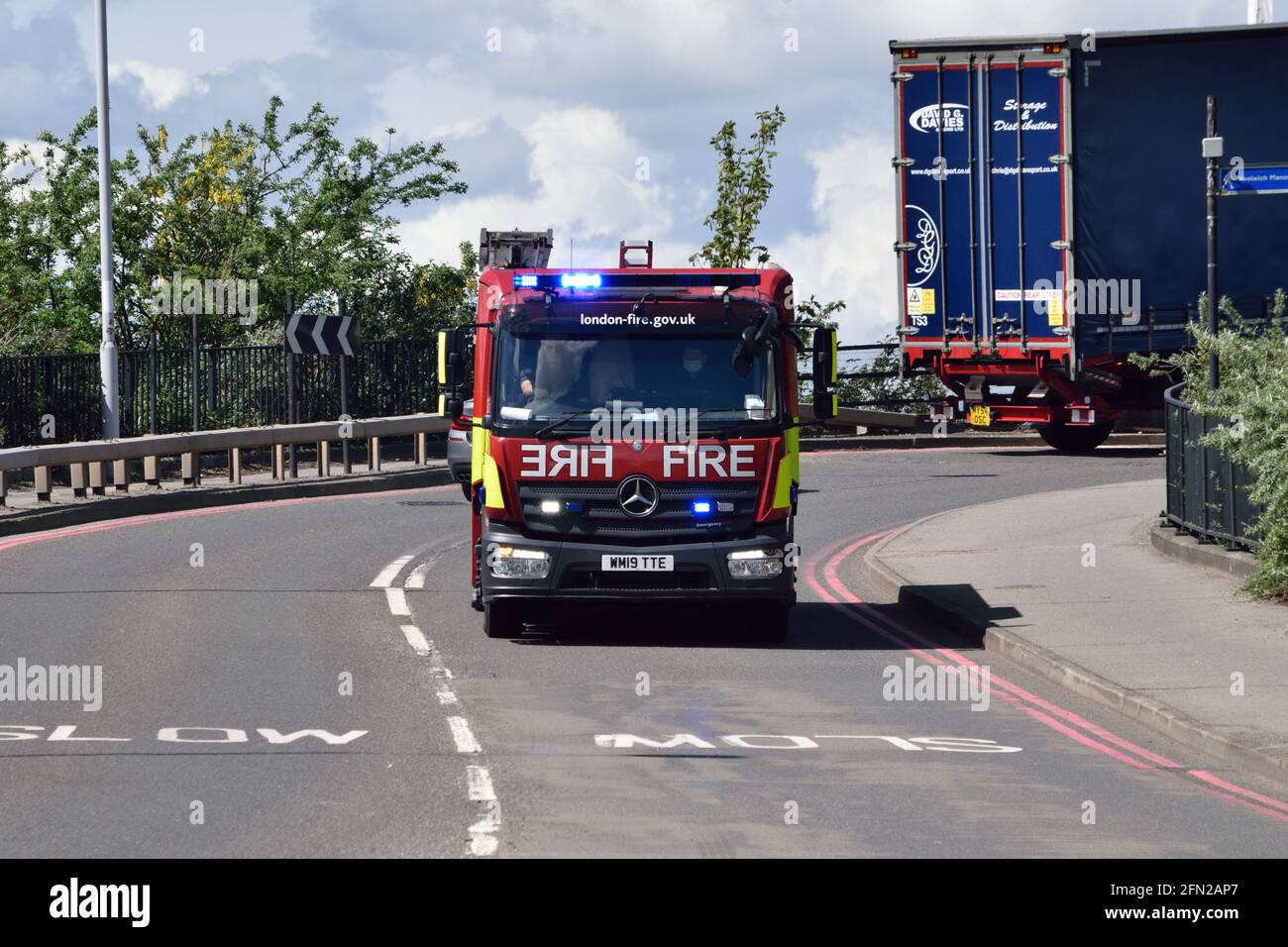 Fire appliance from London Fire Brigade on a blue-light run to attend ...