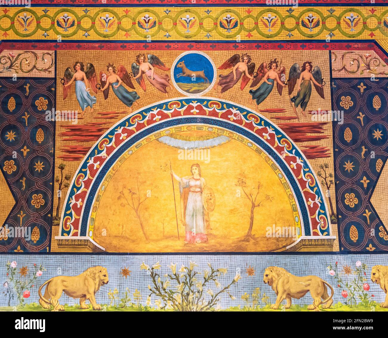 Close-up on colorful religious mosaic decorating wall of catholic ...