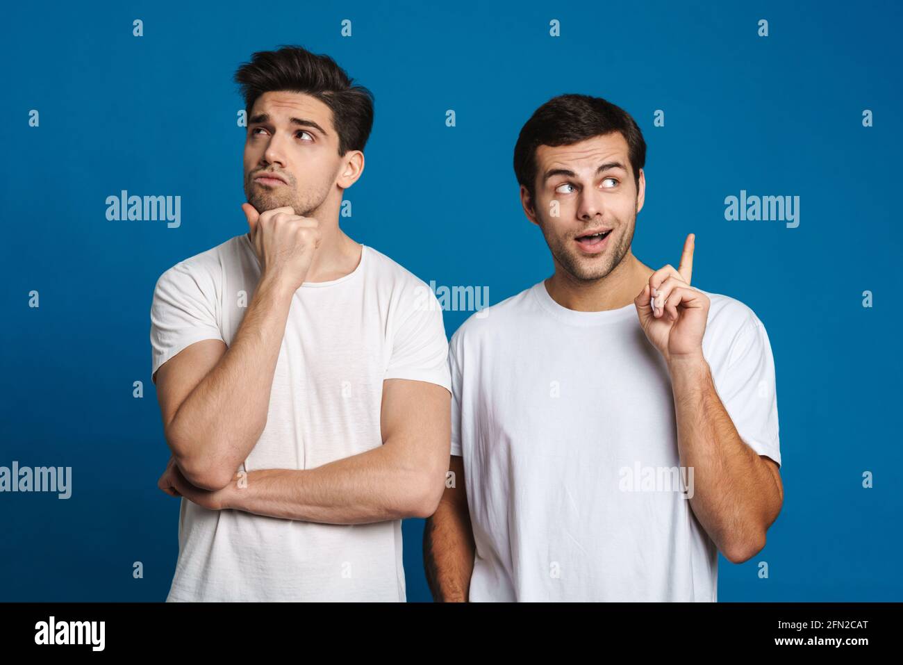Two guys looking hi-res stock photography and images - Alamy
