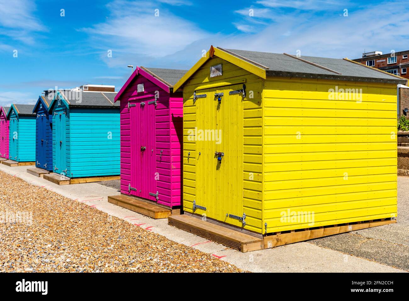 Colourful seafront beach huts hi-res stock photography and images - Alamy