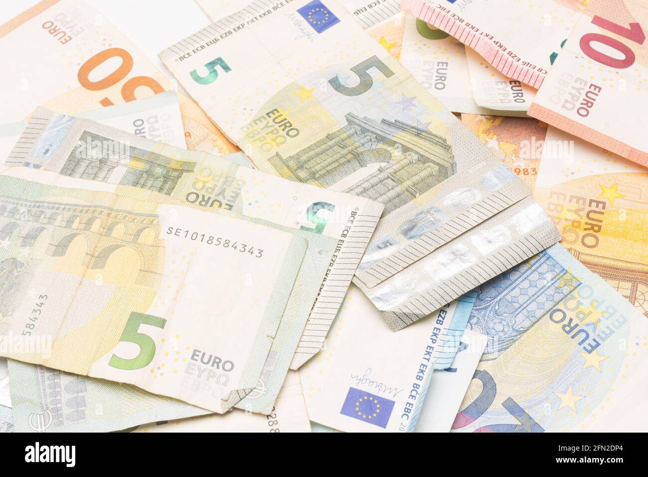 Money, engine of the modern economy, Euro banknotes and coins, official ...