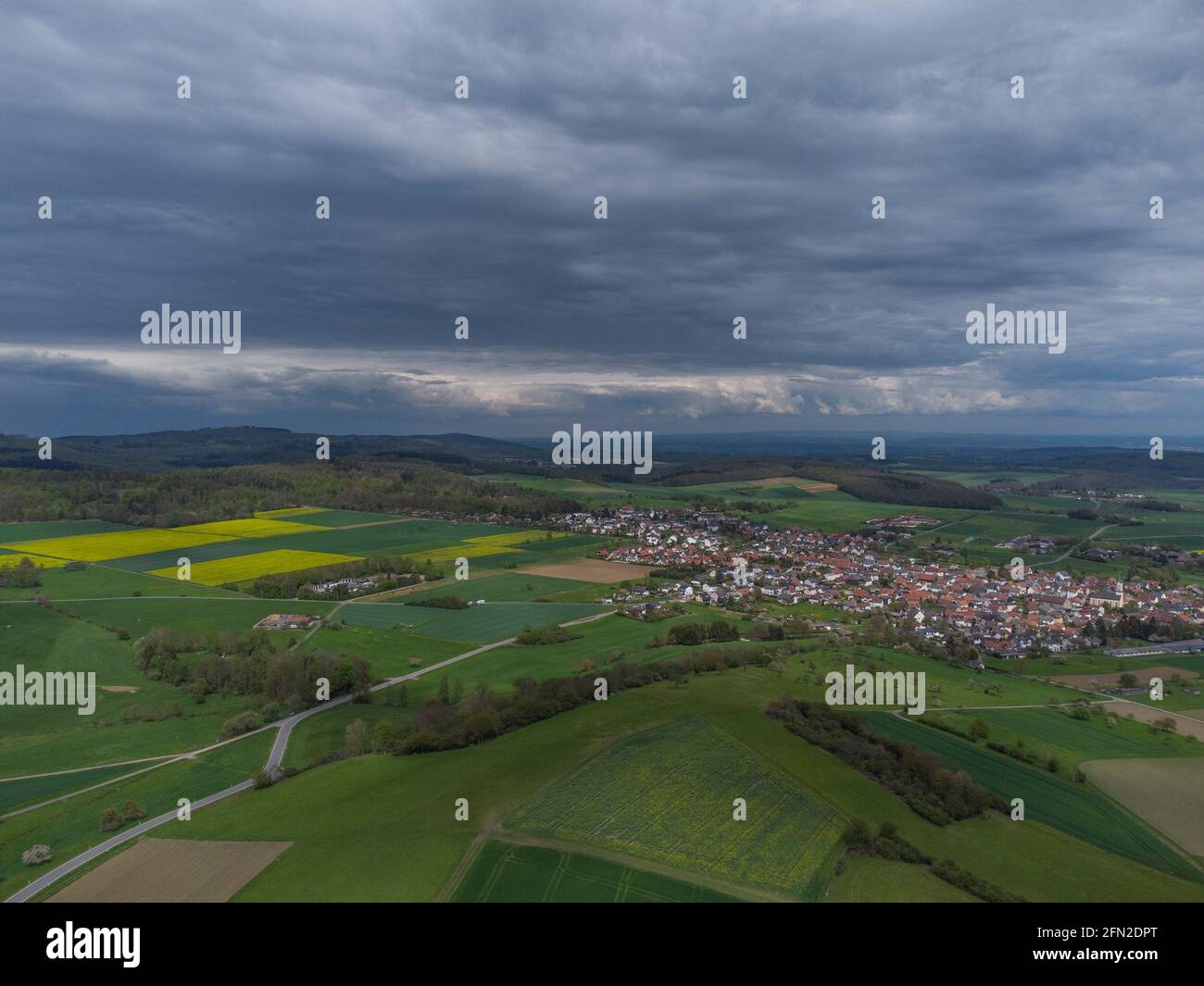 Eschbach, Germany. 13th May, 2021. Dark clouds form in the sky above ...
