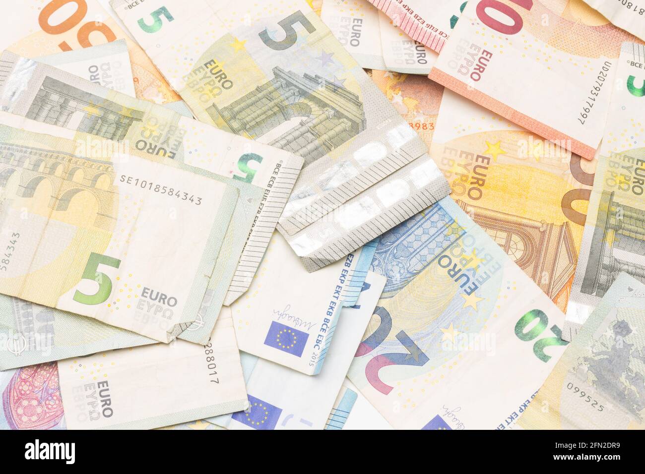 Money, engine of the modern economy, Euro banknotes and coins, official ...