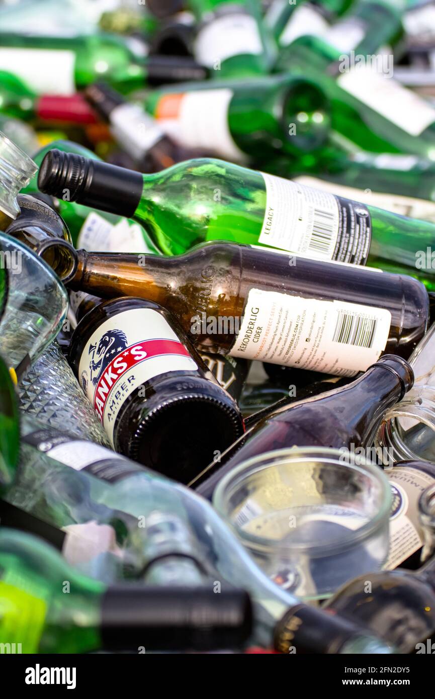 Pile Of Glass And Brown And Green Bottles Awaiting Collection And ...