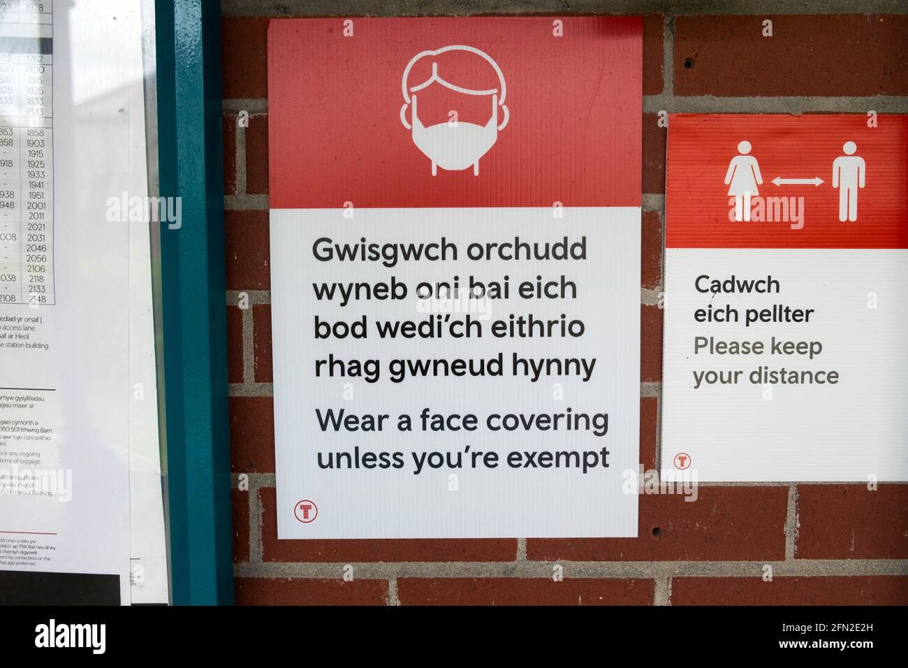 Social distancing bilingual Welsh English language posters on the Heart ...