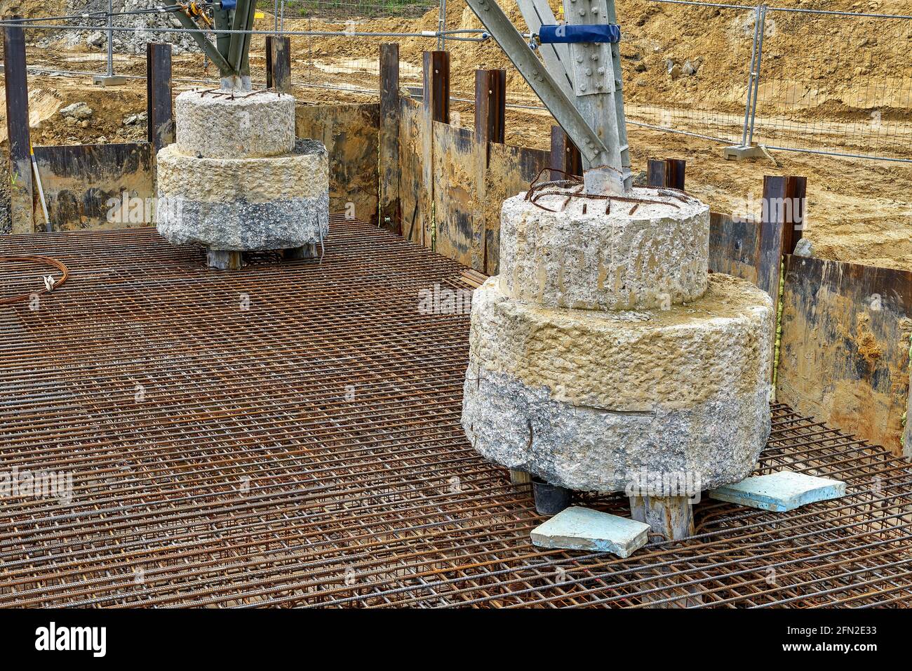 High voltage pylon, maintenance, foundation work and reinforcement ...