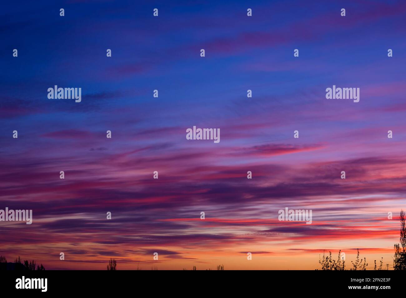 Landscape with dramatic light - beautiful golden sunset with saturated ...