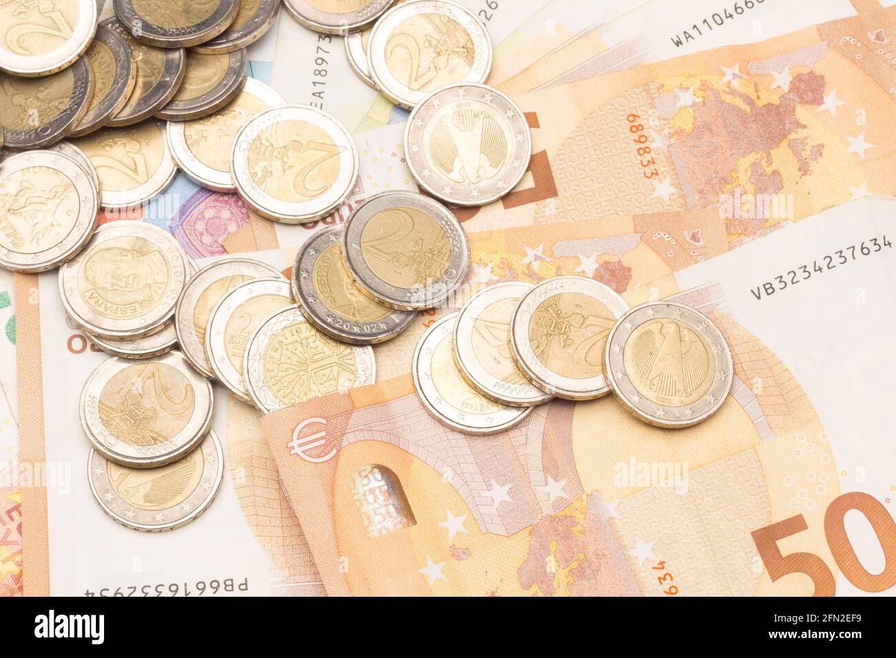 Euro coins and banknotes, close-up of the official currency of Europe ...