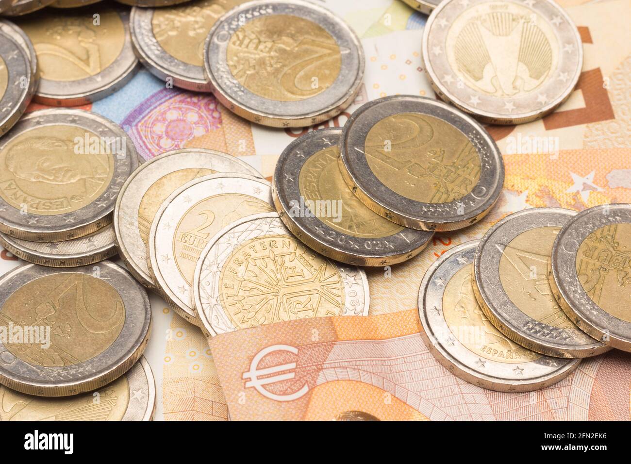 Euro coins and banknotes, close-up of the official currency of Europe ...