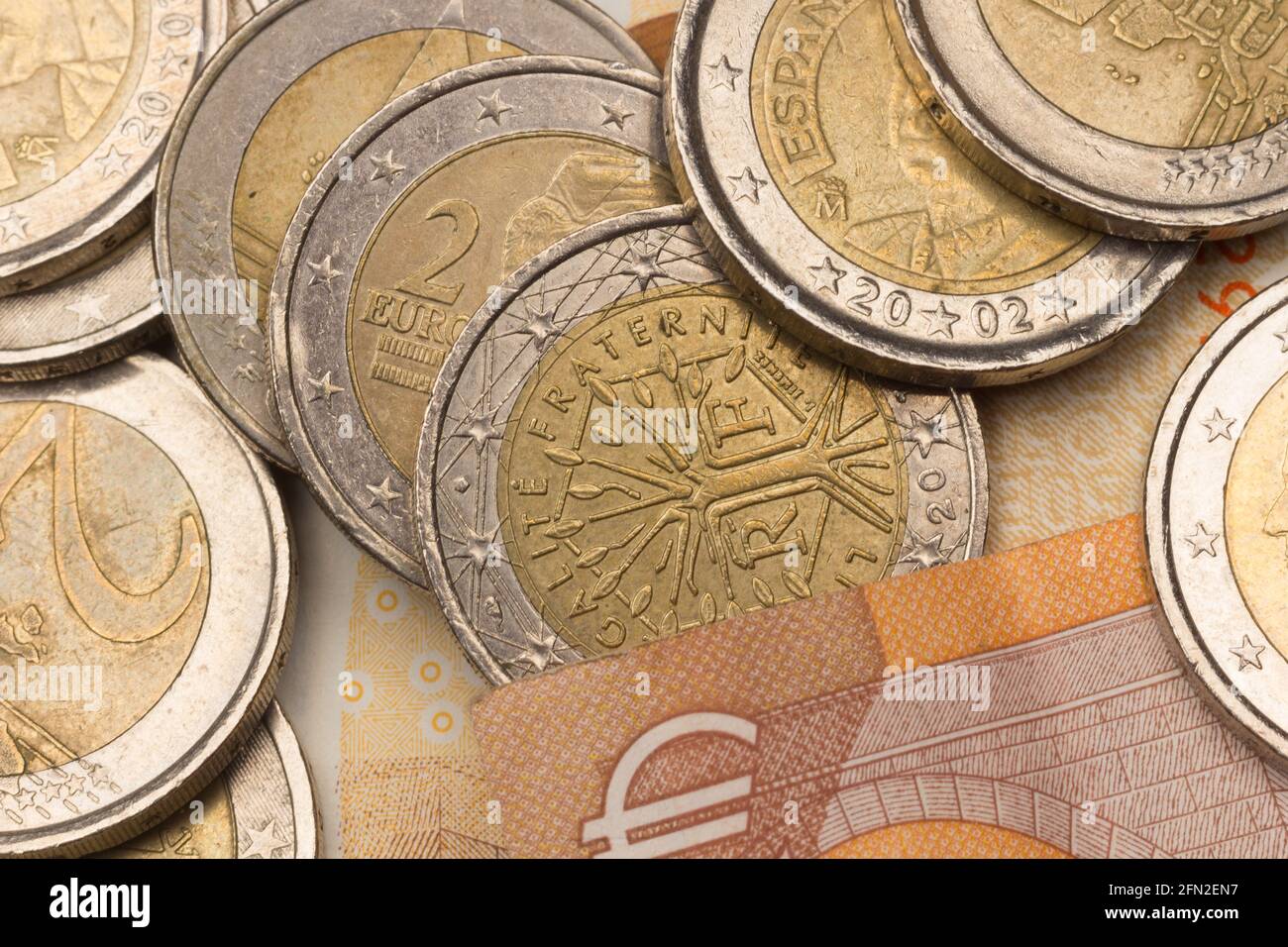 Euro coins and banknotes, close-up of the official currency of Europe ...