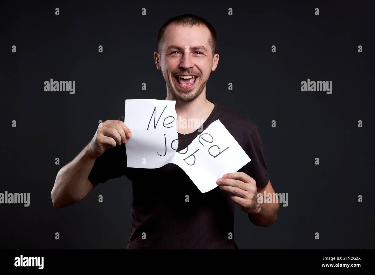 Poster tearing hi-res stock photography and images - Alamy