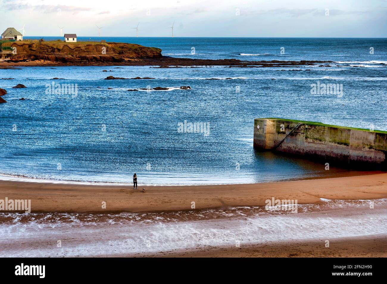People walking over sand bars as the tide goes out Stock Photo - Alamy