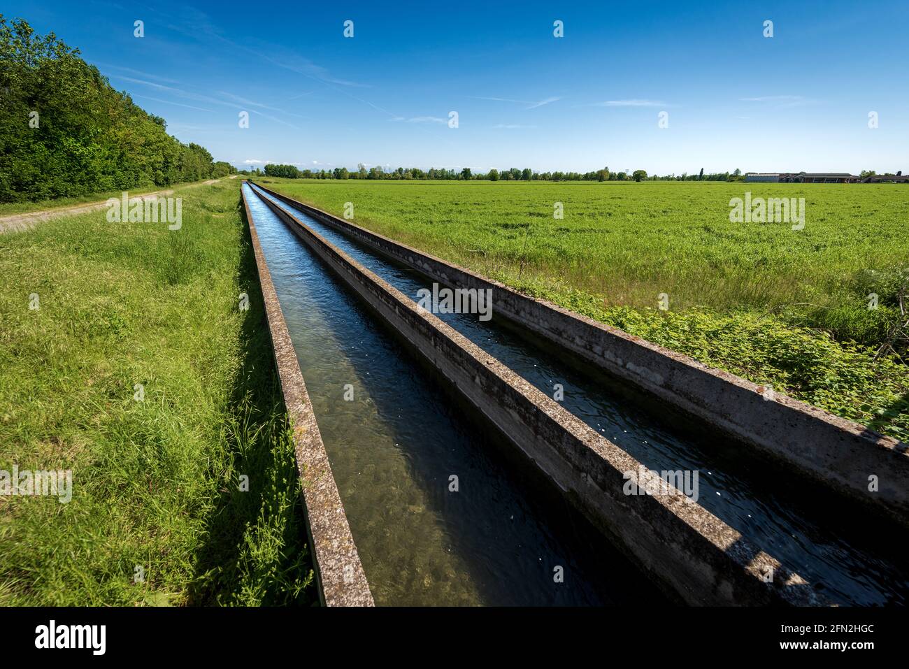 Two small reinforced concrete irrigation canals in the Padan Plain or ...