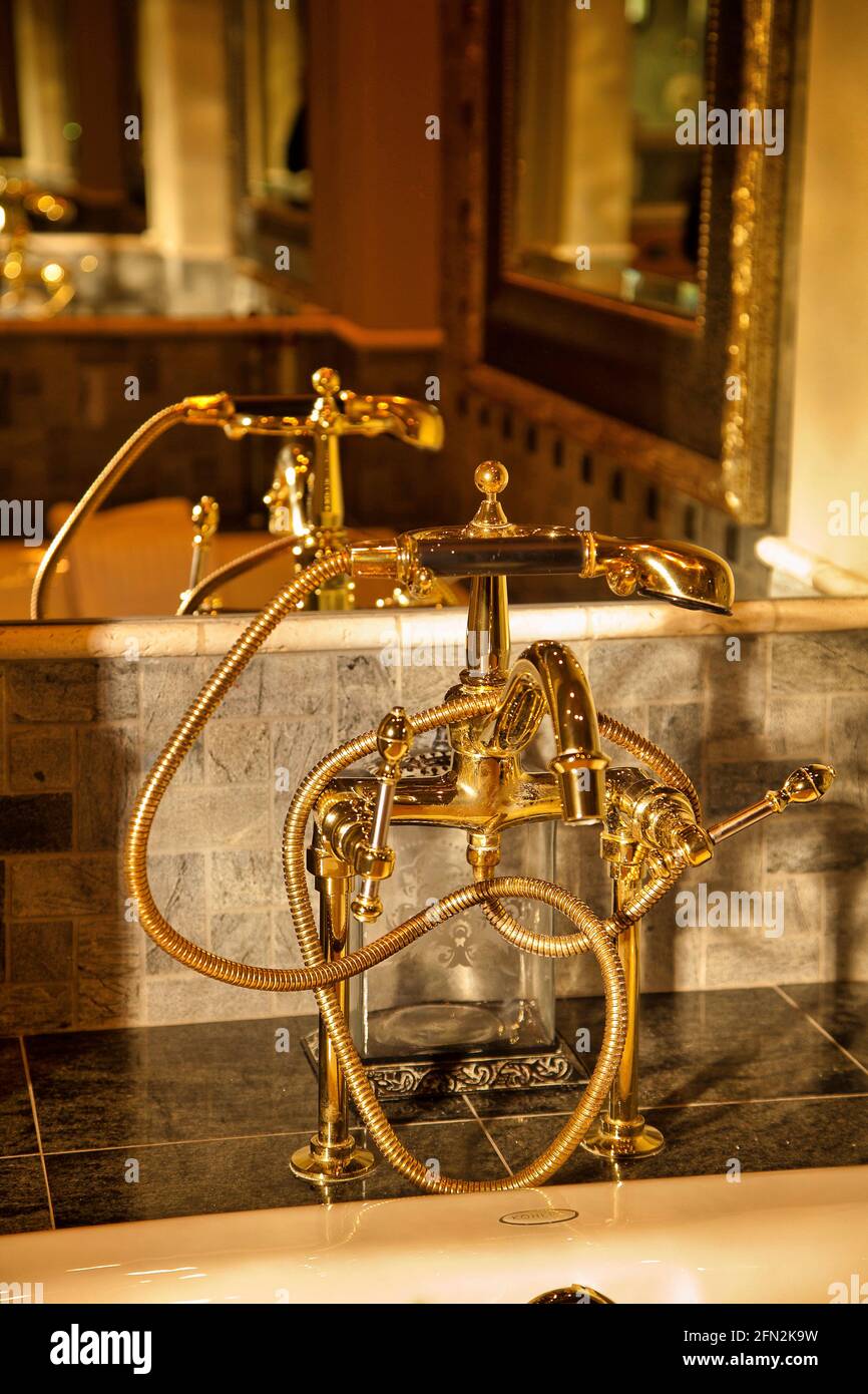 luxury golden taps in a bathroom of a Los Angeles mansion Stock Photo ...