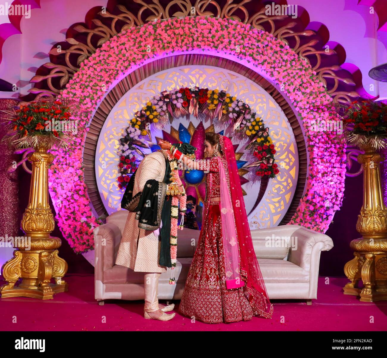 gorgeous stunning indian bride and groom wearing traditionally dress ...