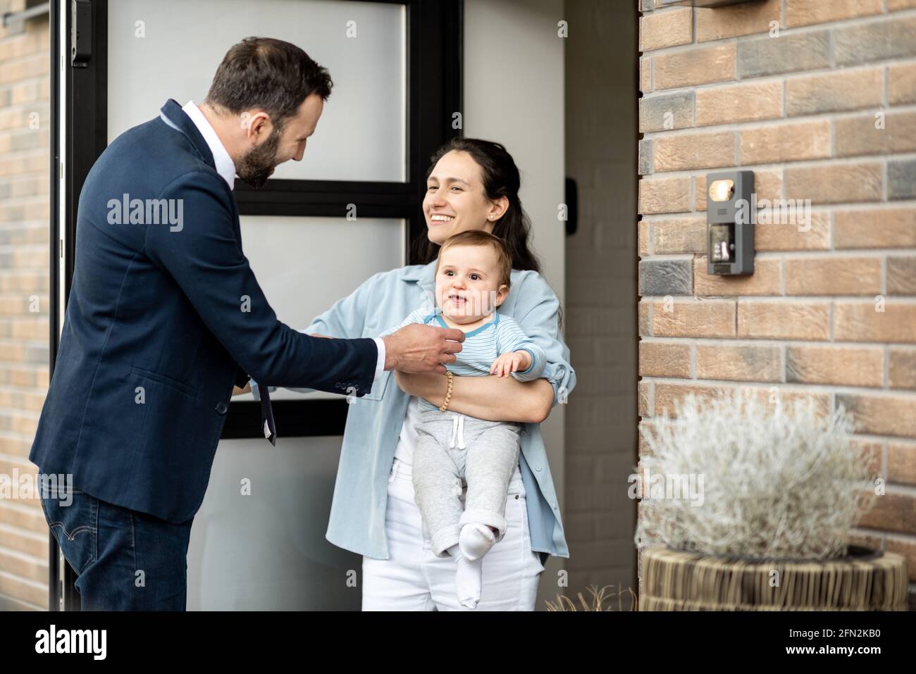 Waving from front door hi-res stock photography and images - Alamy