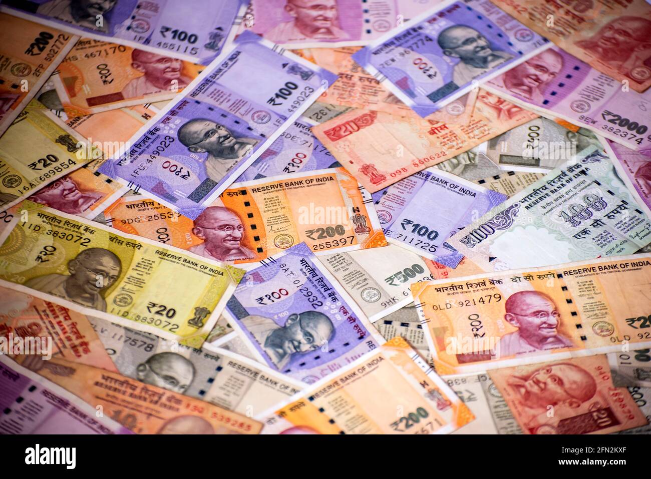 Many various Indian paper currency background Stock Photo - Alamy