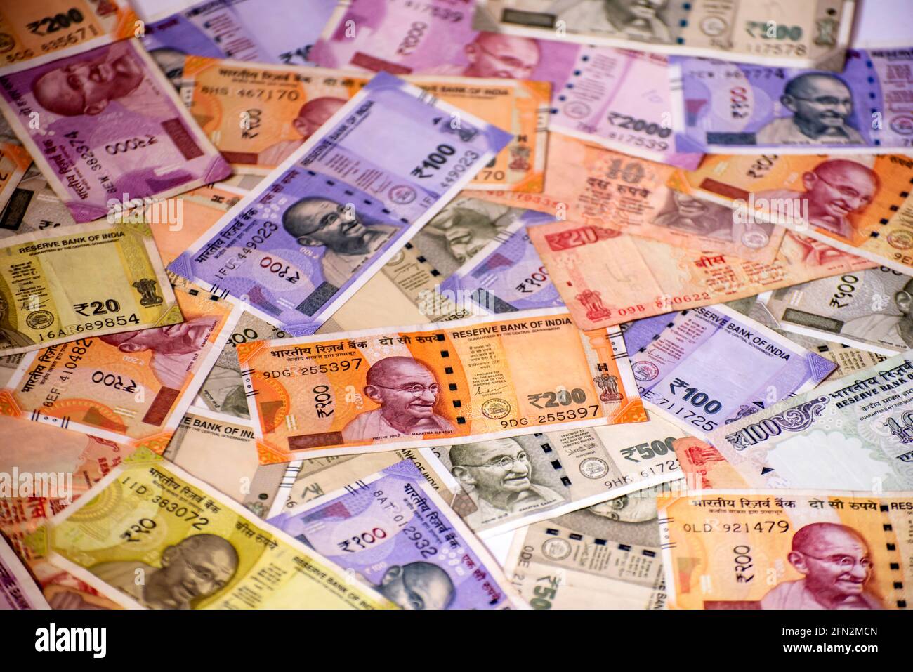 Many various Indian paper currency background Stock Photo - Alamy