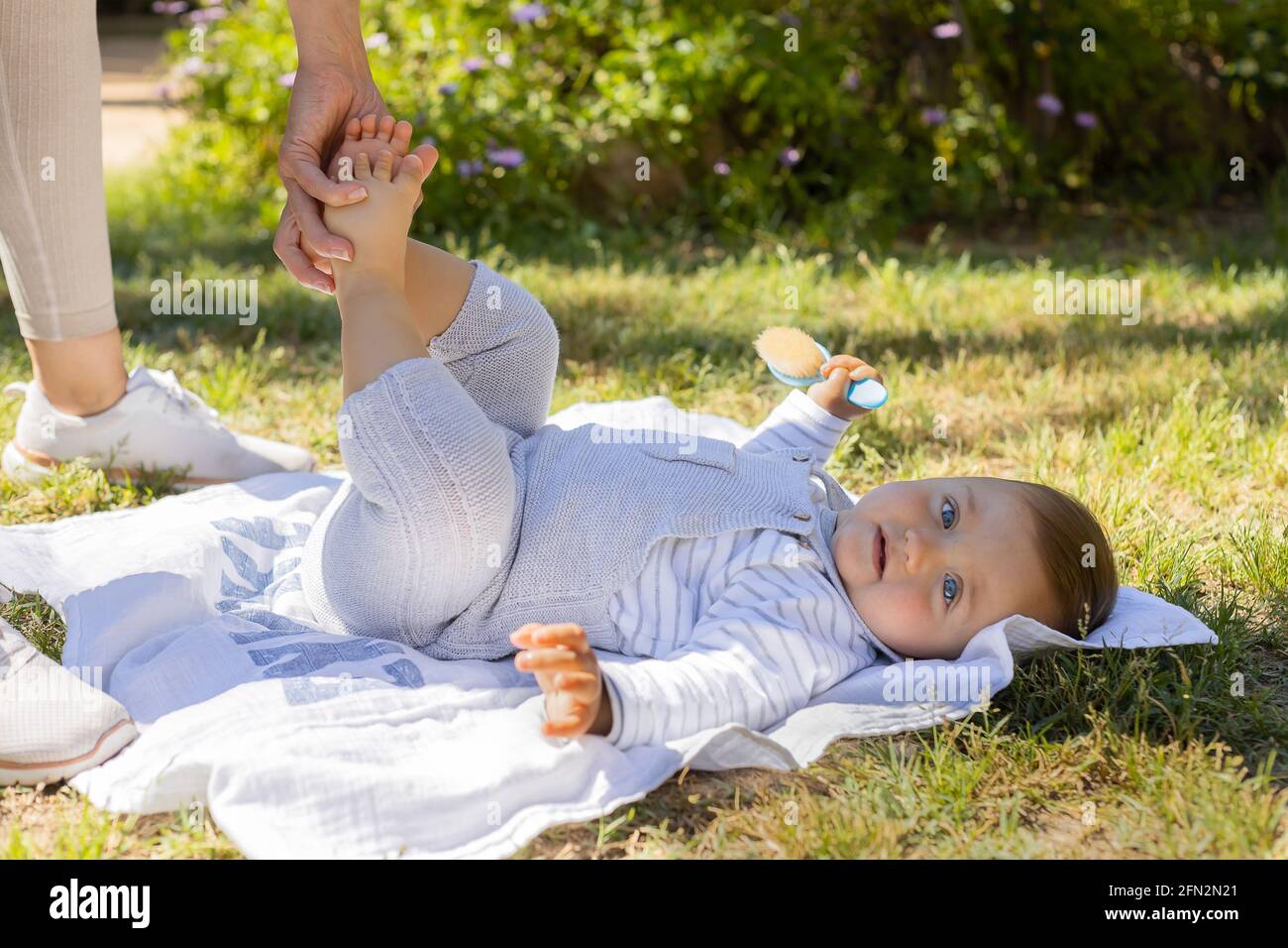 Baby lying down hi-res stock photography and images - Alamy