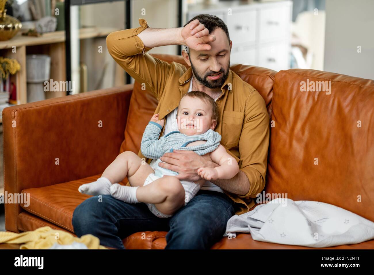 Father home alone hi-res stock photography and images - Alamy