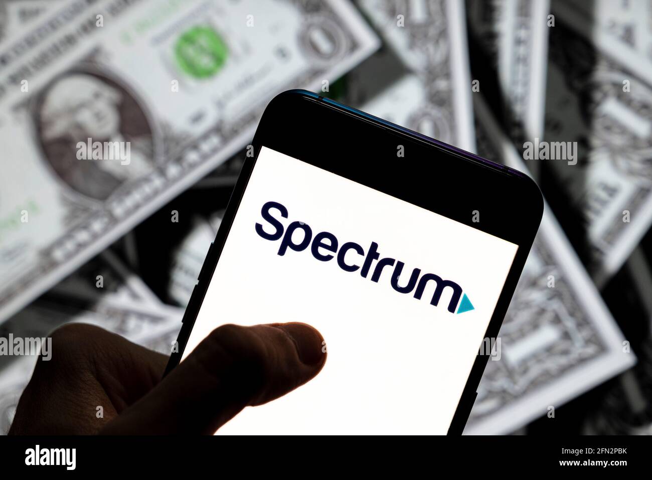 In this photo illustration the American telecommunications company ...