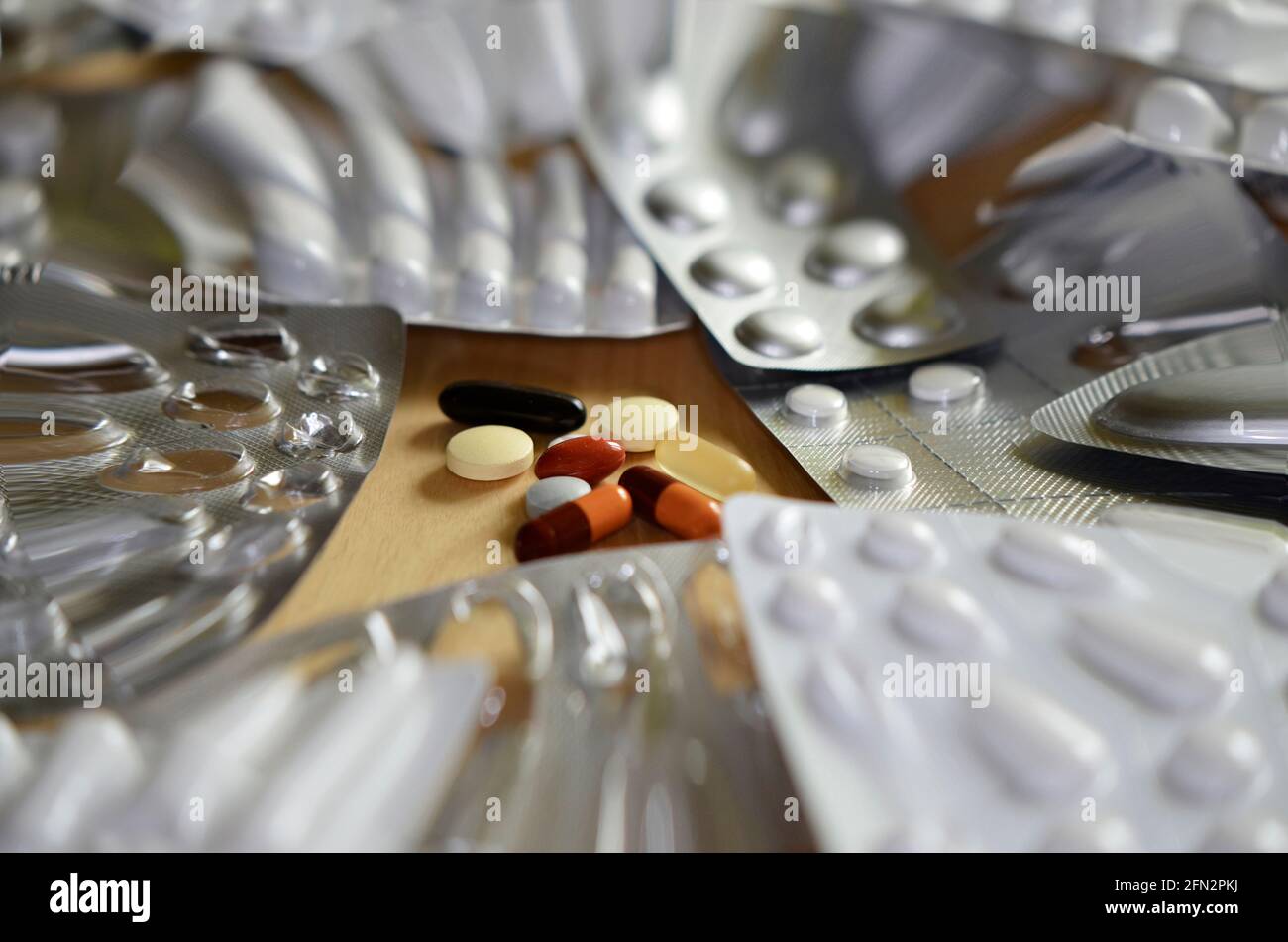 Tablets in the middle of distorted packages as a symbolic photo for ...