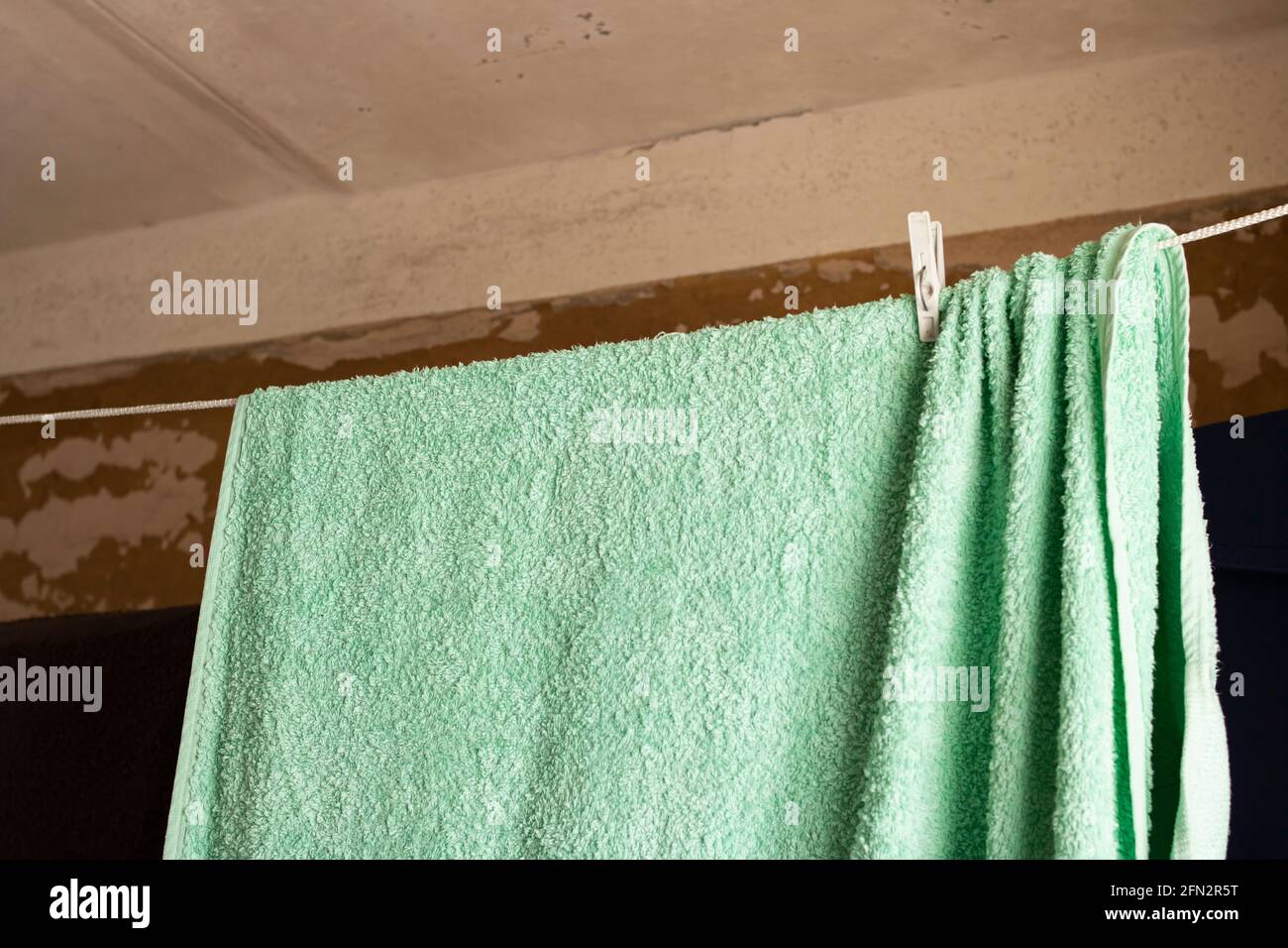 Laundry is drying on the line close up Stock Photo - Alamy