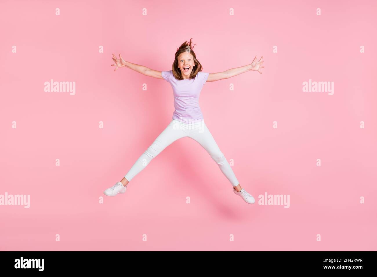 Full size photo of happy funky little girl jump up star shape dream ...