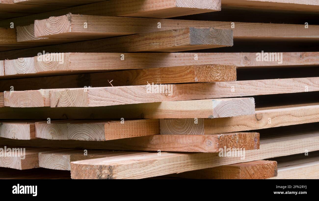 Stacked wooden beams close up Stock Photo - Alamy