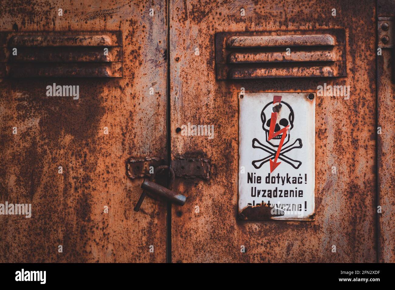 electrical device warning sign on rusty locker," electrical device! don ...