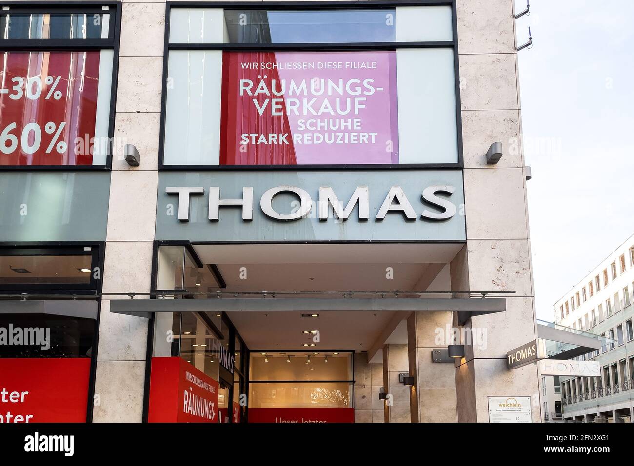 Thomas fashion store sign in Munich Stock Photo - Alamy